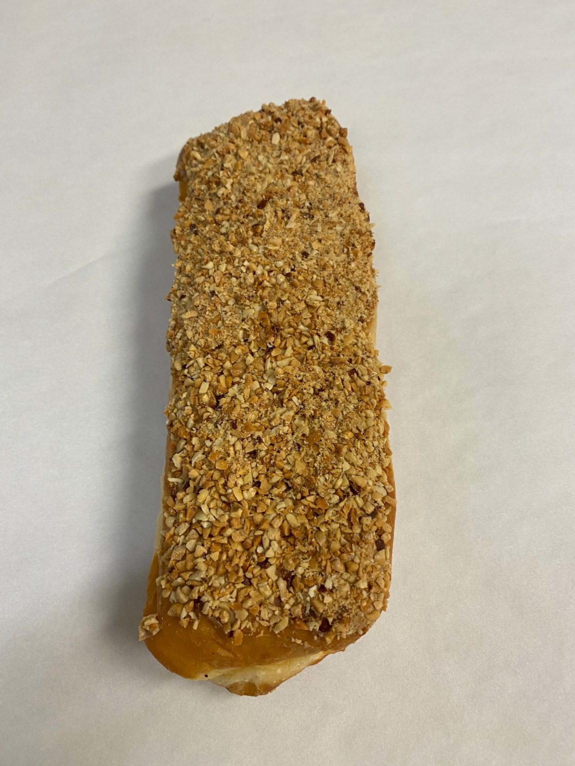 Maple Iced Long John with Crushed Peanuts Donut | Wedding Cakes ...